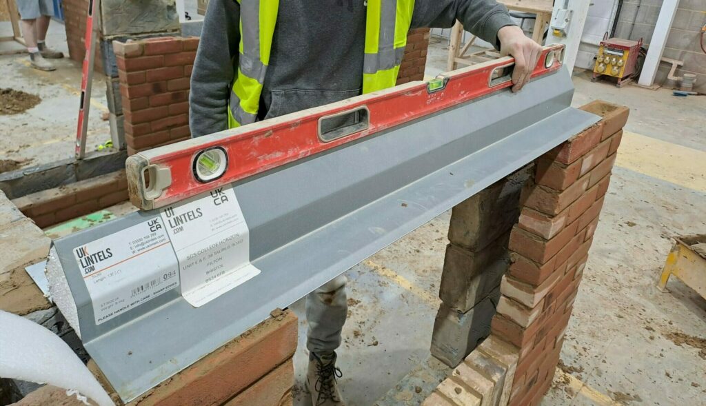 Drilling through concrete lintel store